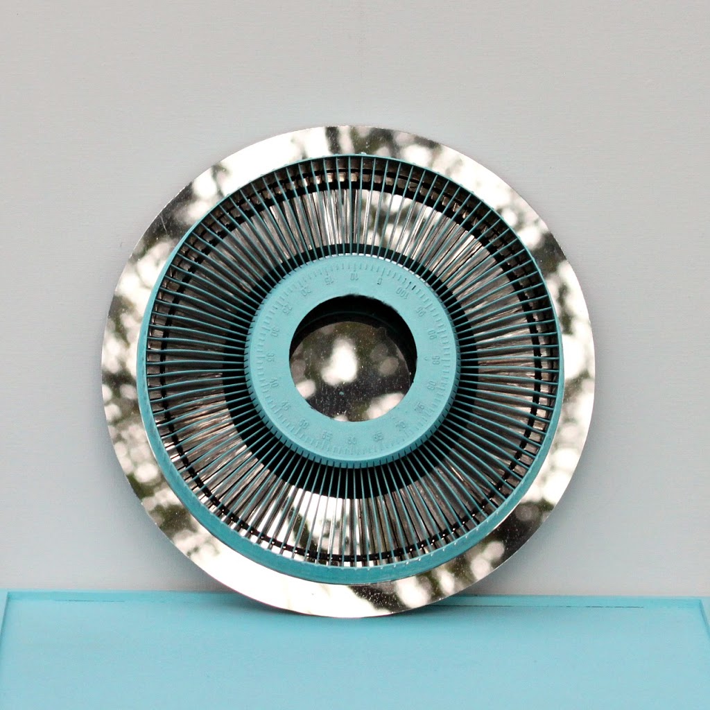 Three Ways to Repurpose a Slide Carousel from Goodwill - Morena's Corner